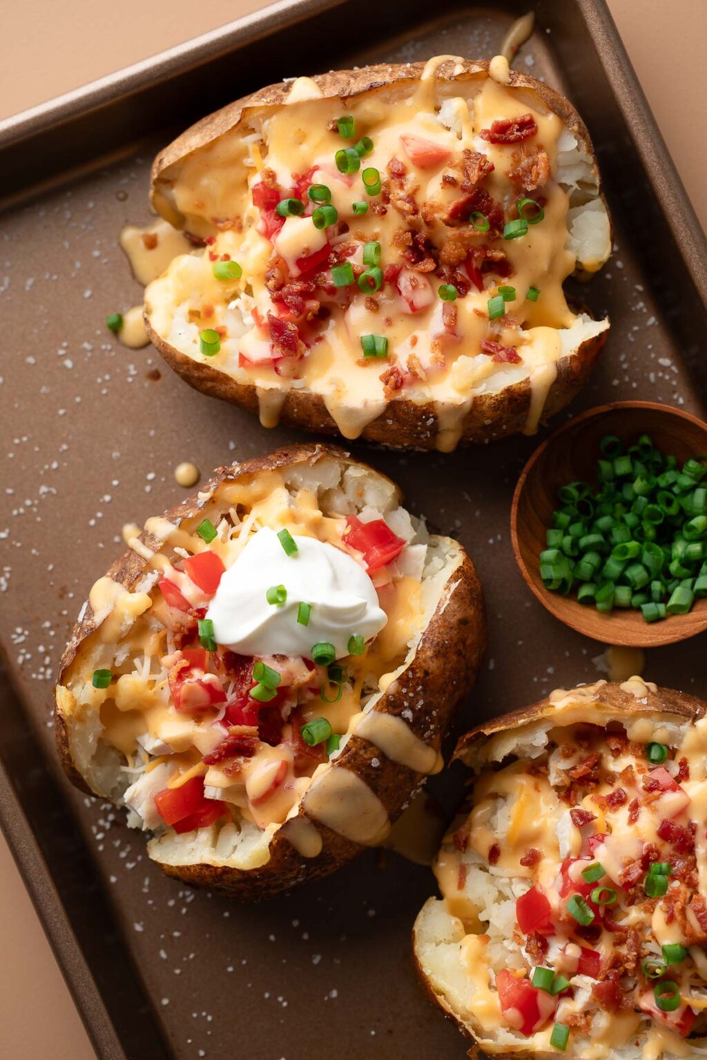 Cheesy Loaded Baked Potatoes with Chicken and Bacon